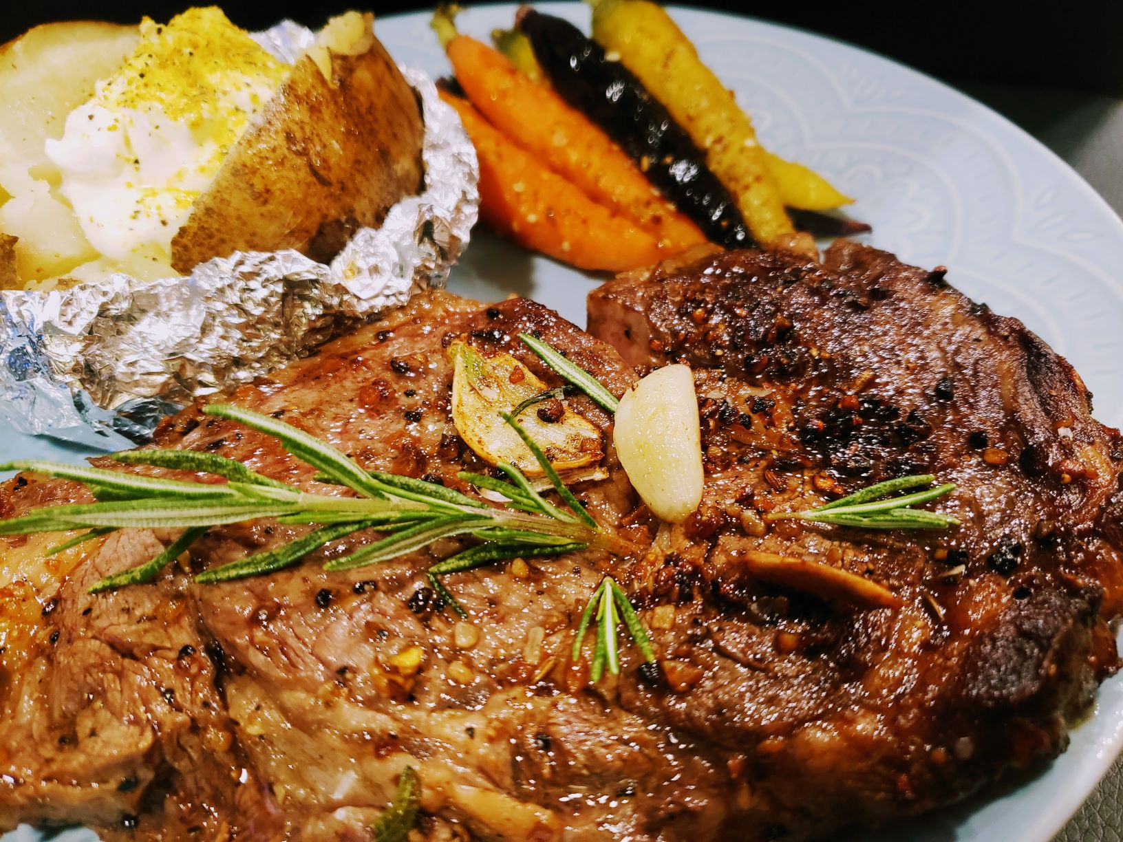 Ribeye Steak with Dukkah Rainbow Carrots and Baked Potato - Sweet Zivile